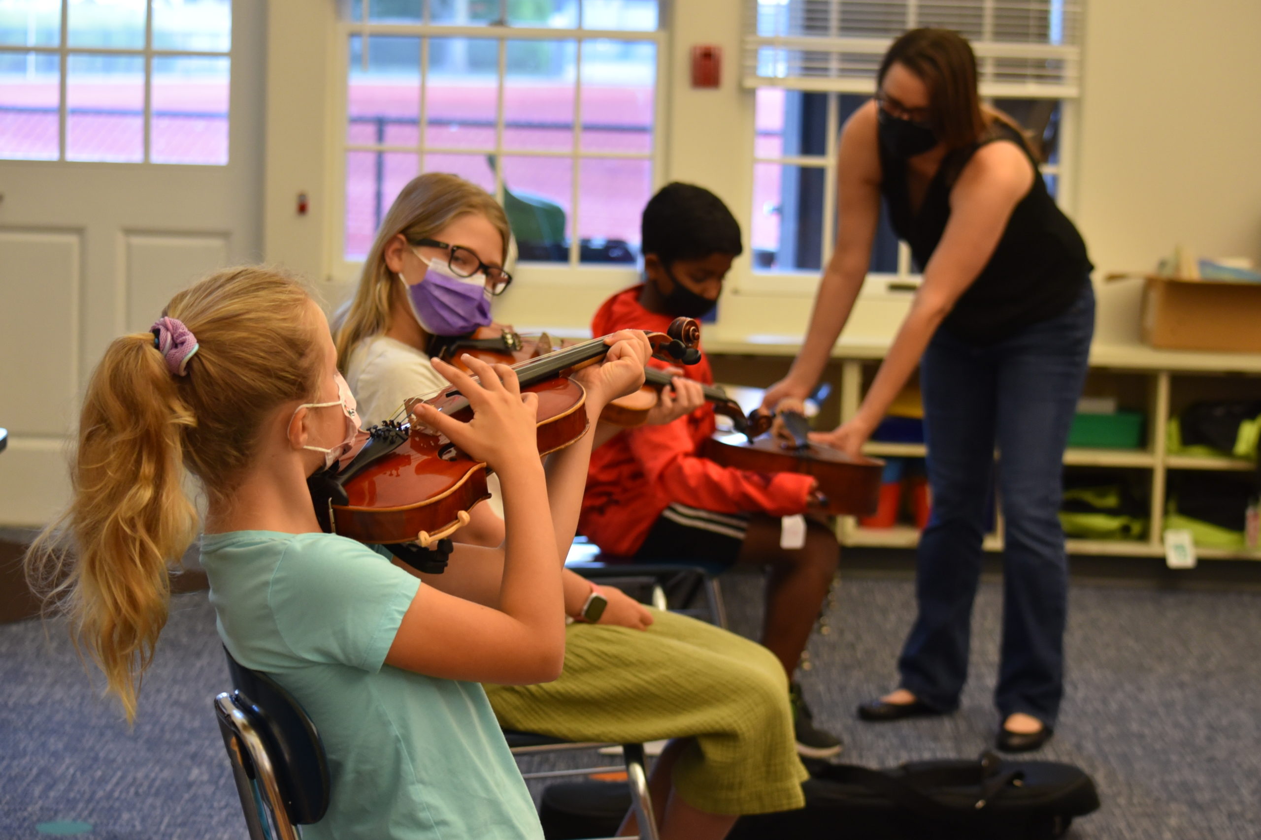 Lower School Students Explore Strings - Seven Hills School